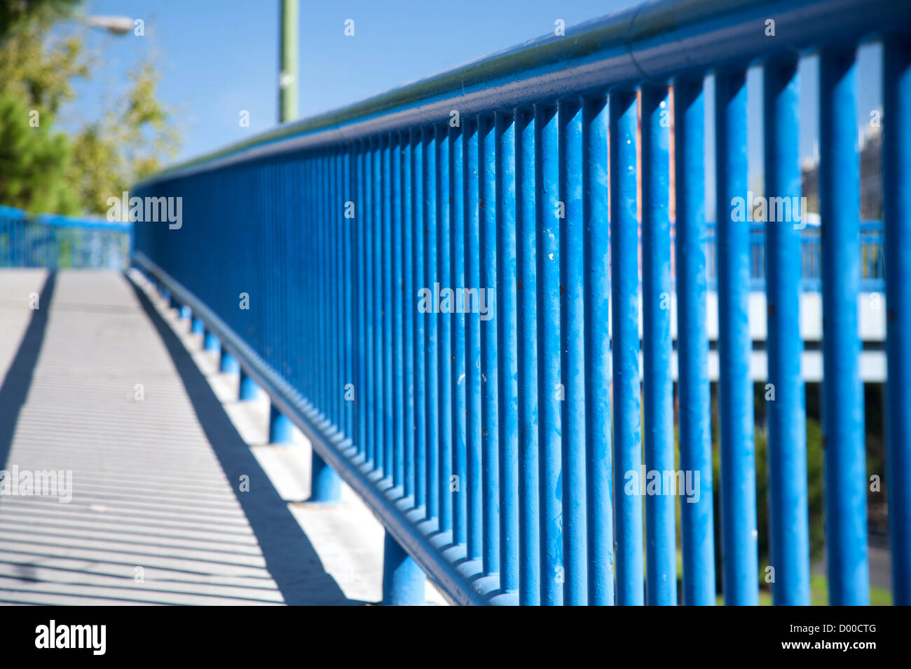 footbridge with blue railing in madrid city Stock Photo - Alamy