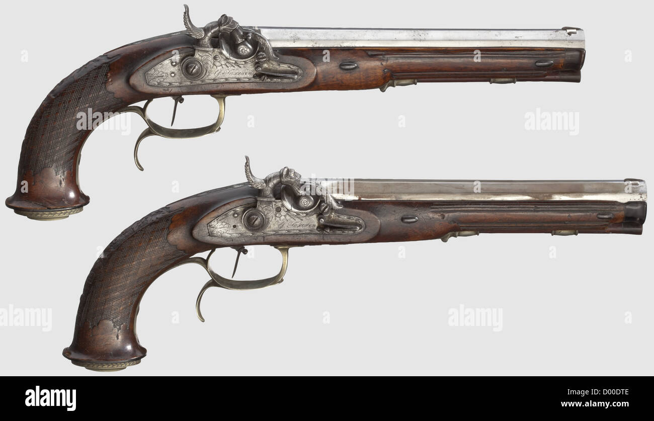 A pair of German percussion pistols,circa 1850. Octagonal barrels with ...