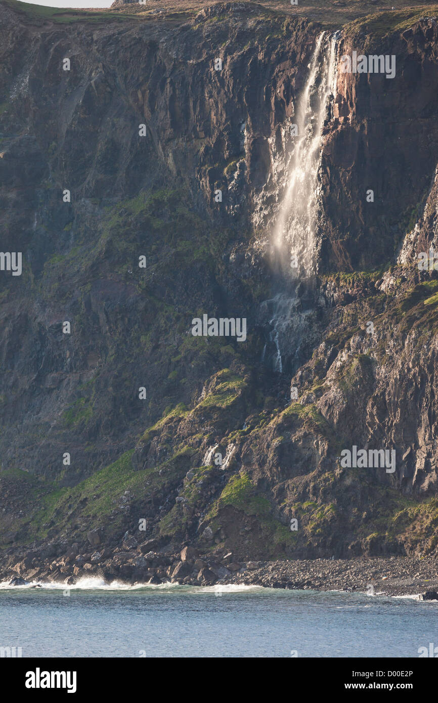 The waterfall from Allt Mheididh at Talisker Bay in the Scottish ...