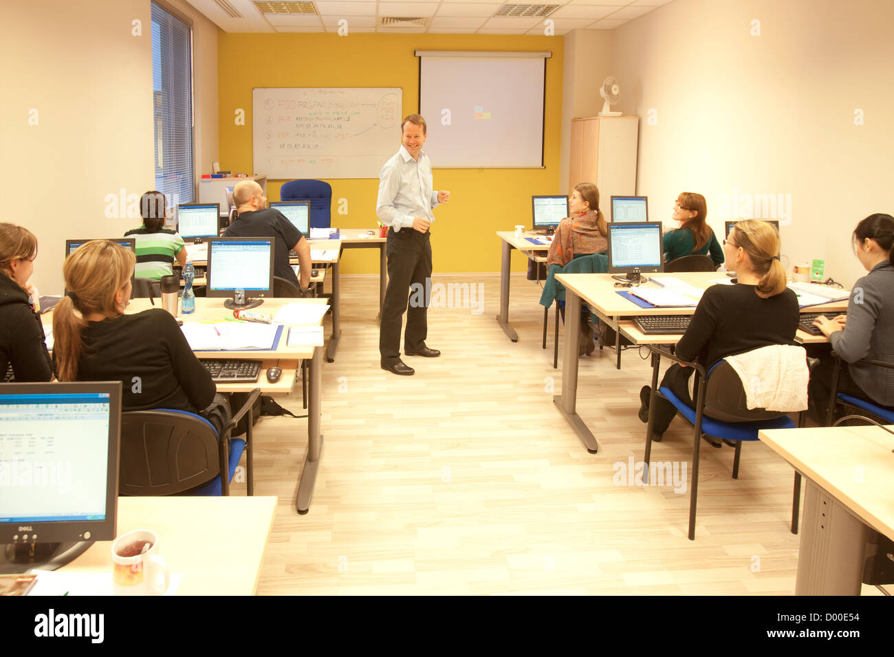 group of people in business training listening to instructor Stock ...