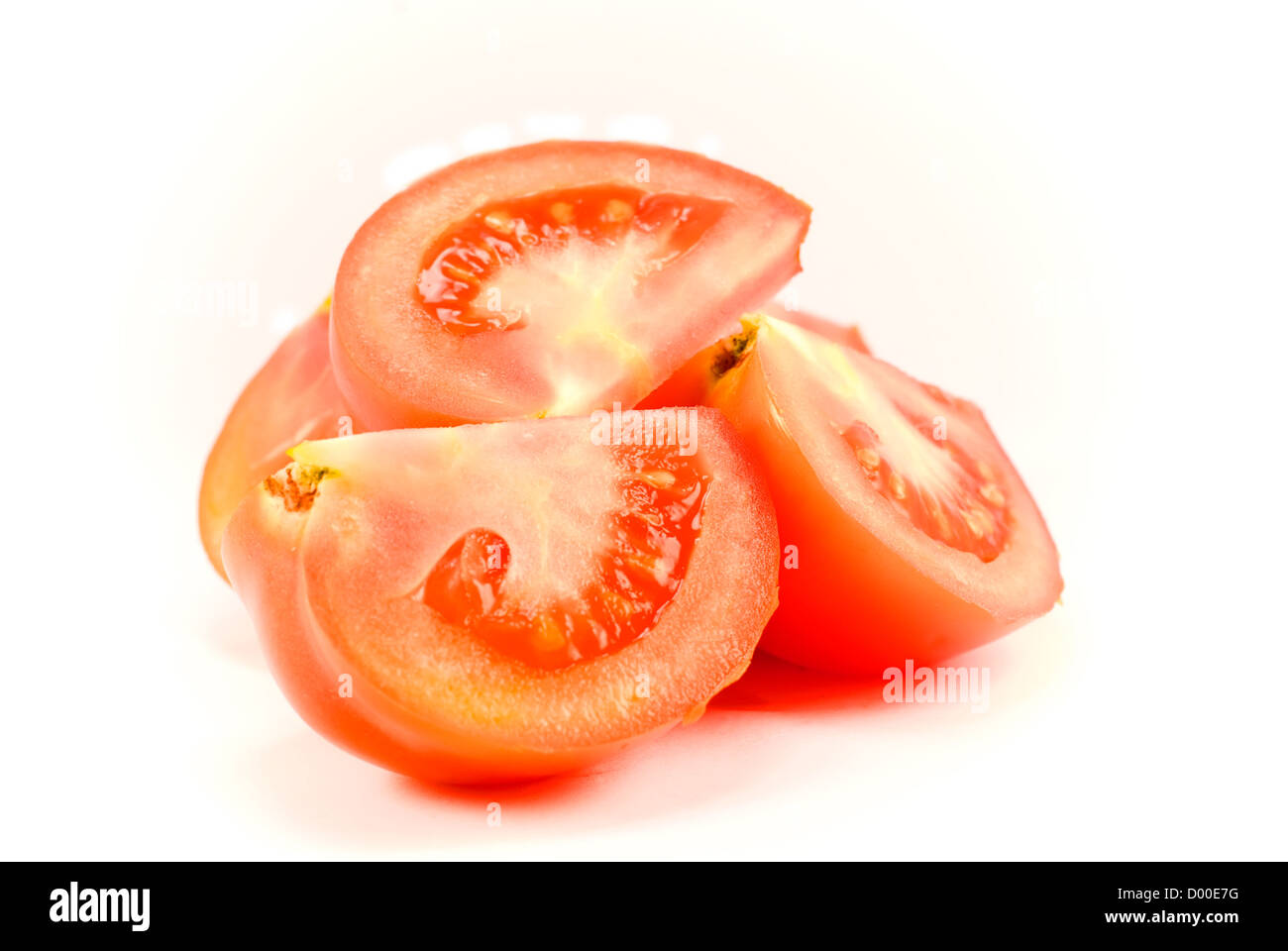 Quartered tomatoes Cut Out Stock Images & Pictures - Alamy