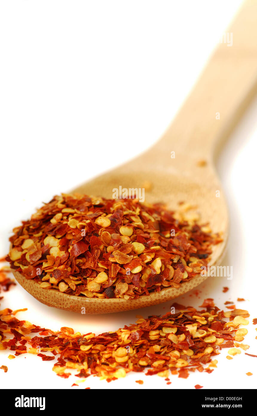 Spoonful of hot Italian red pepper flakes known as peperoncino Stock ...