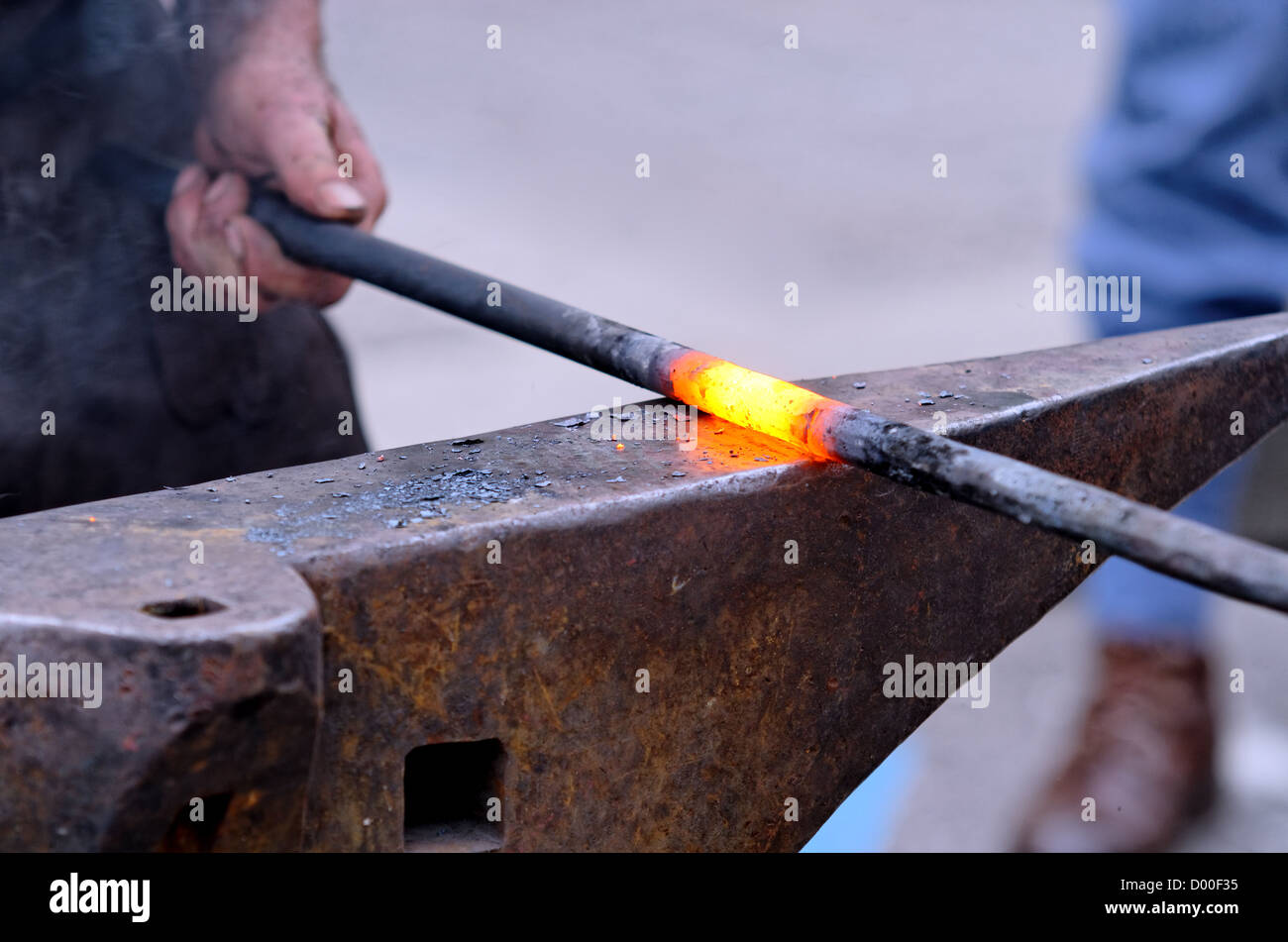 a blacksmith at work Stock Photo - Alamy