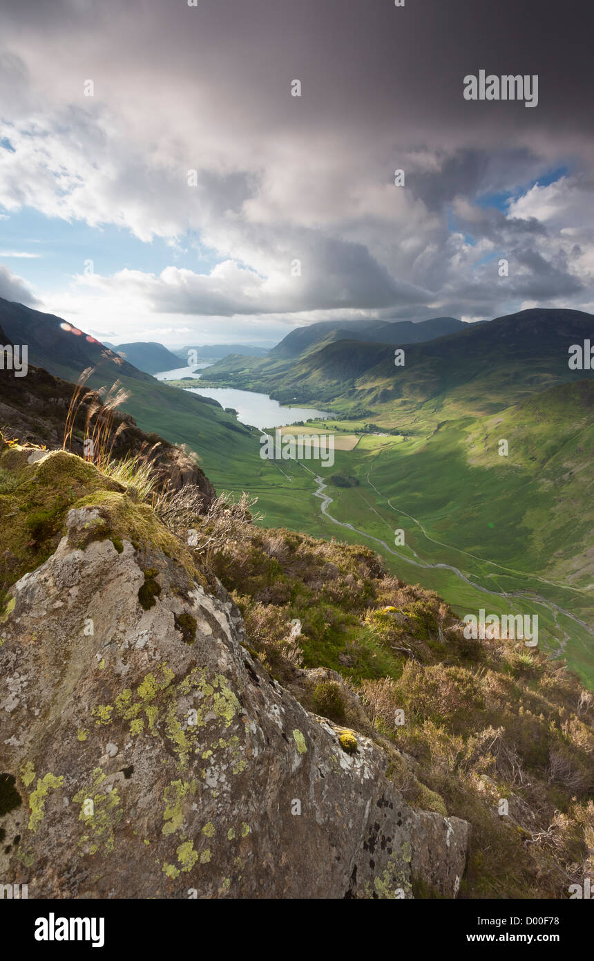 A cloudy sunset over Lake Buttermere from the summit of Haystacks in ...