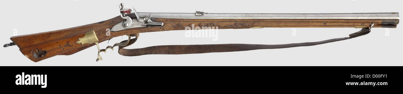 A Scandinavian flintlock rifle,mid 18th century. Slightly swamped ...