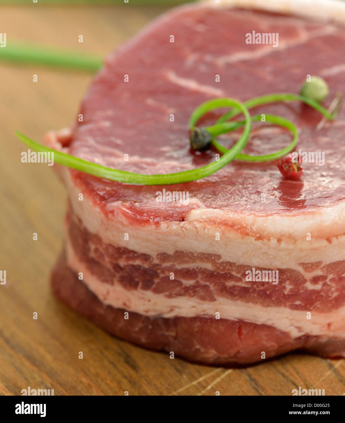 Bacon Wrapped Beef Fillet With Spices Stock Photo - Alamy