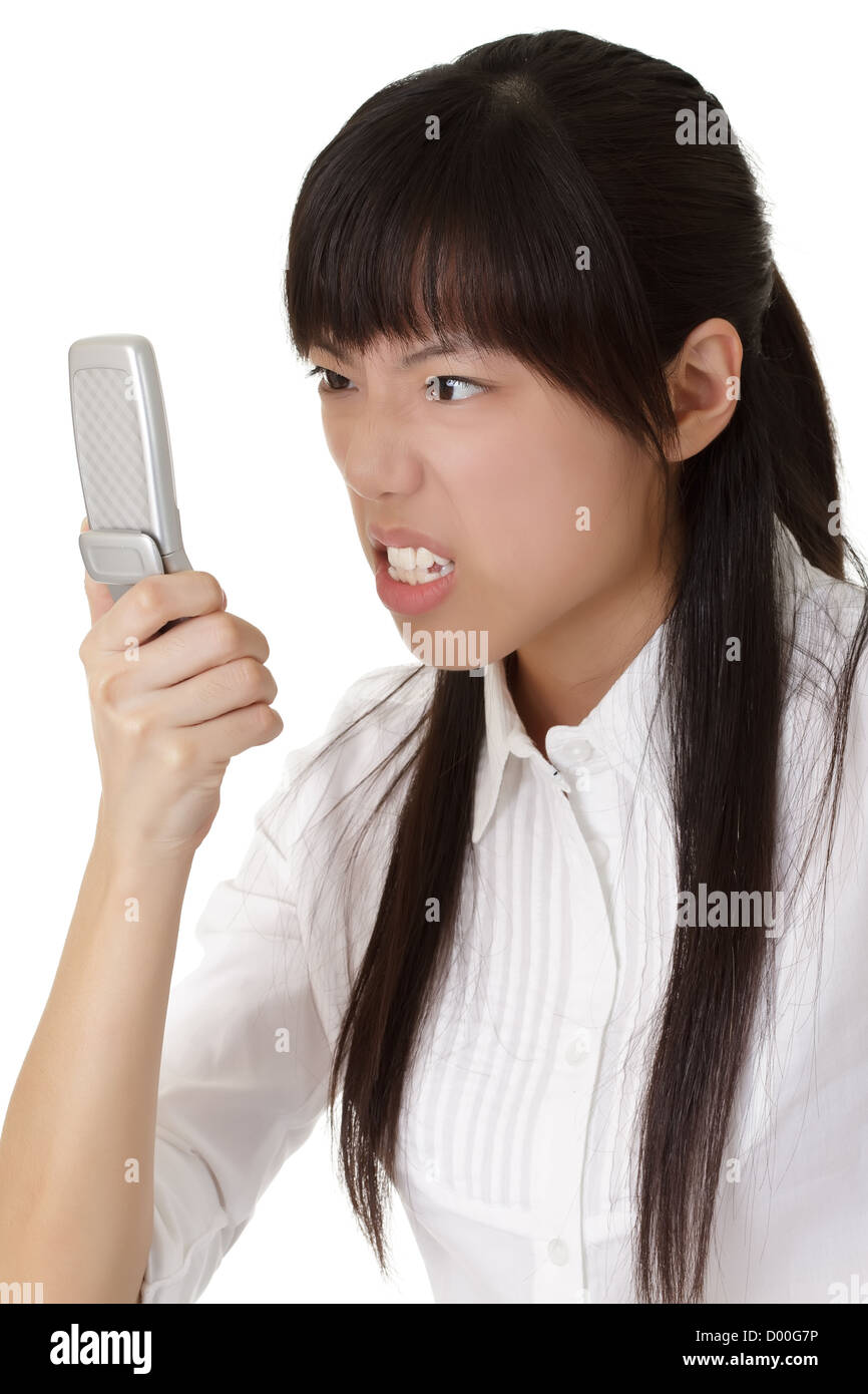 Angry business woman staring cellphone with expression of anger Stock ...