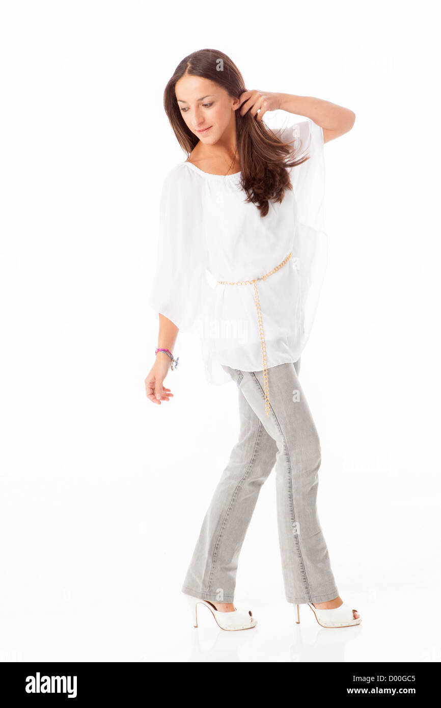 real young beautiful woman walking and looking backside Stock Photo - Alamy