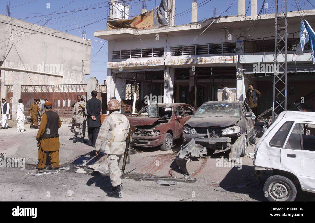 Security official inspect site after bomb explosion which exploded when ...