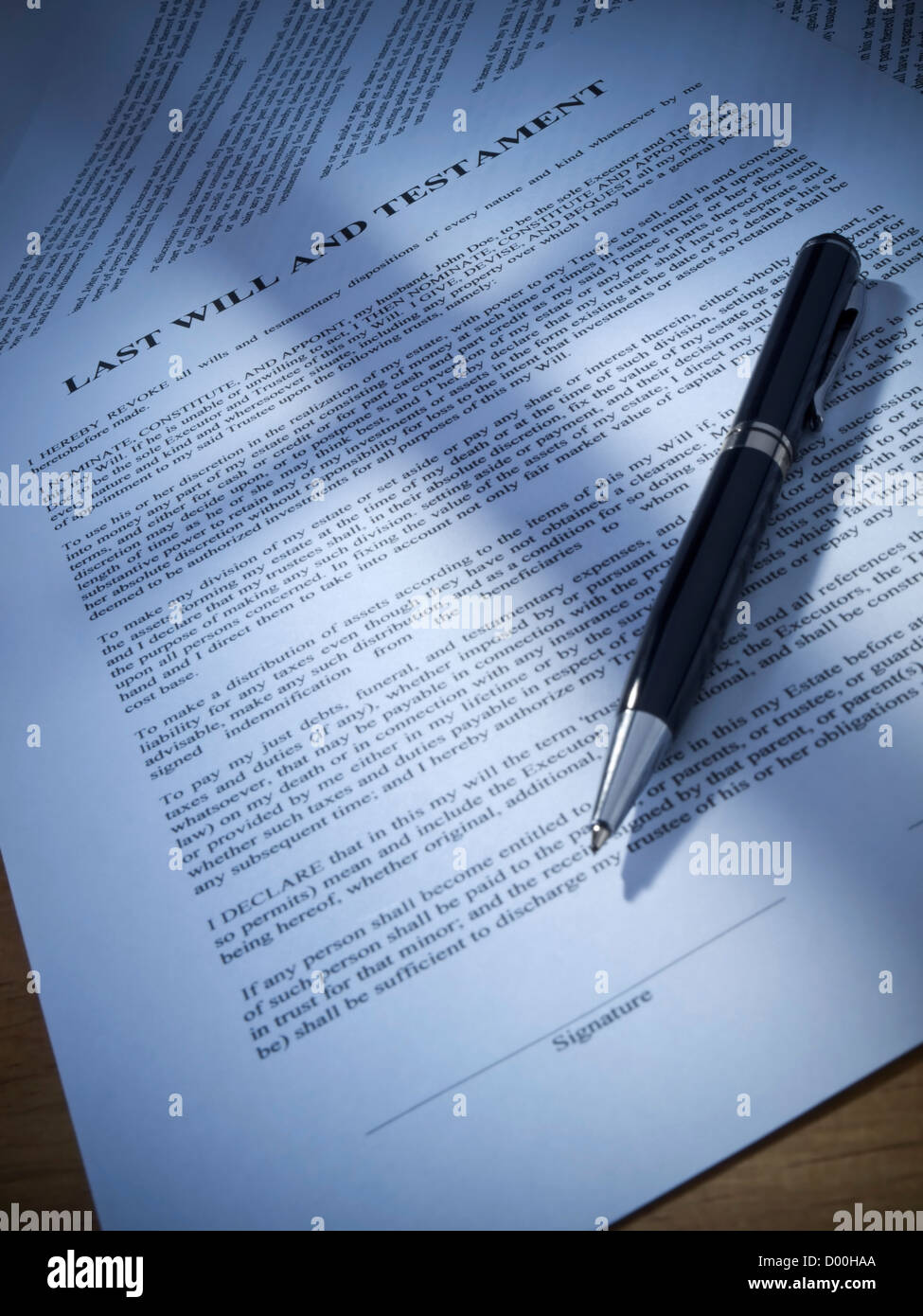 A cross shape shadow over the testament to be signed Stock Photo - Alamy