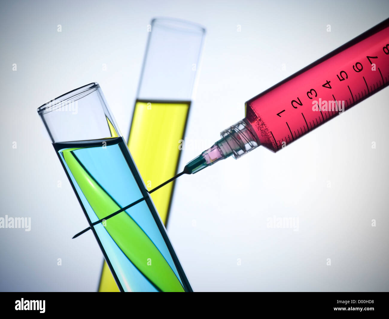 A syringe and two test tubes filled with color liquids Stock Photo - Alamy A syringe and two test tubes filled with color liquids Stock Photo - Alamy