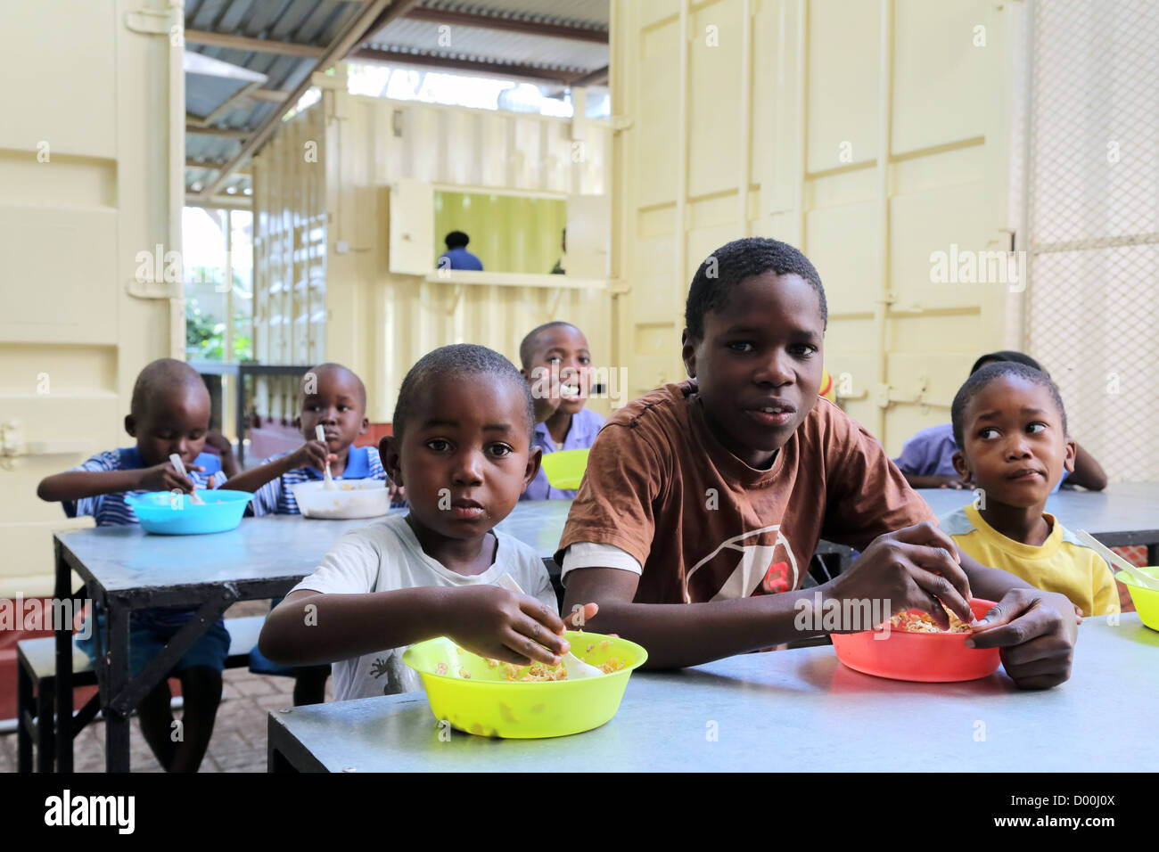 Poor children eating hi-res stock photography and images - Alamy