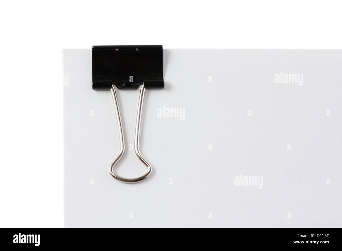Macro view of black paper clip isolated over white Stock Photo - Alamy