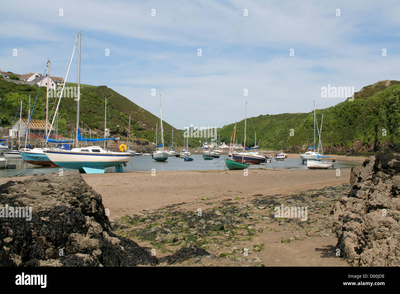 Boats in Harbour low water Solva Pembrokeshire Wales UK Stock Photo - Alamy