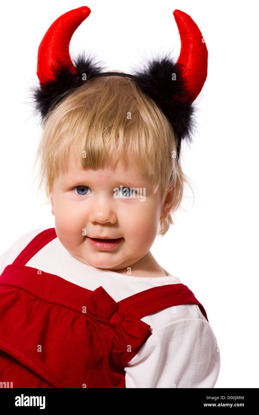Portrait of little girl wearing devil's horns isolated Stock Photo - Alamy