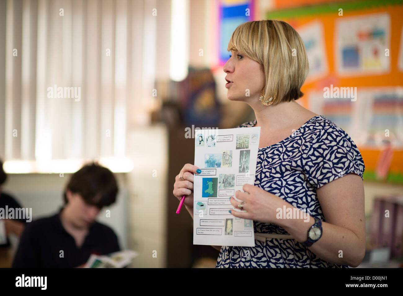 A Woman Teacher Teaching History At A Secondary Comprehensive School