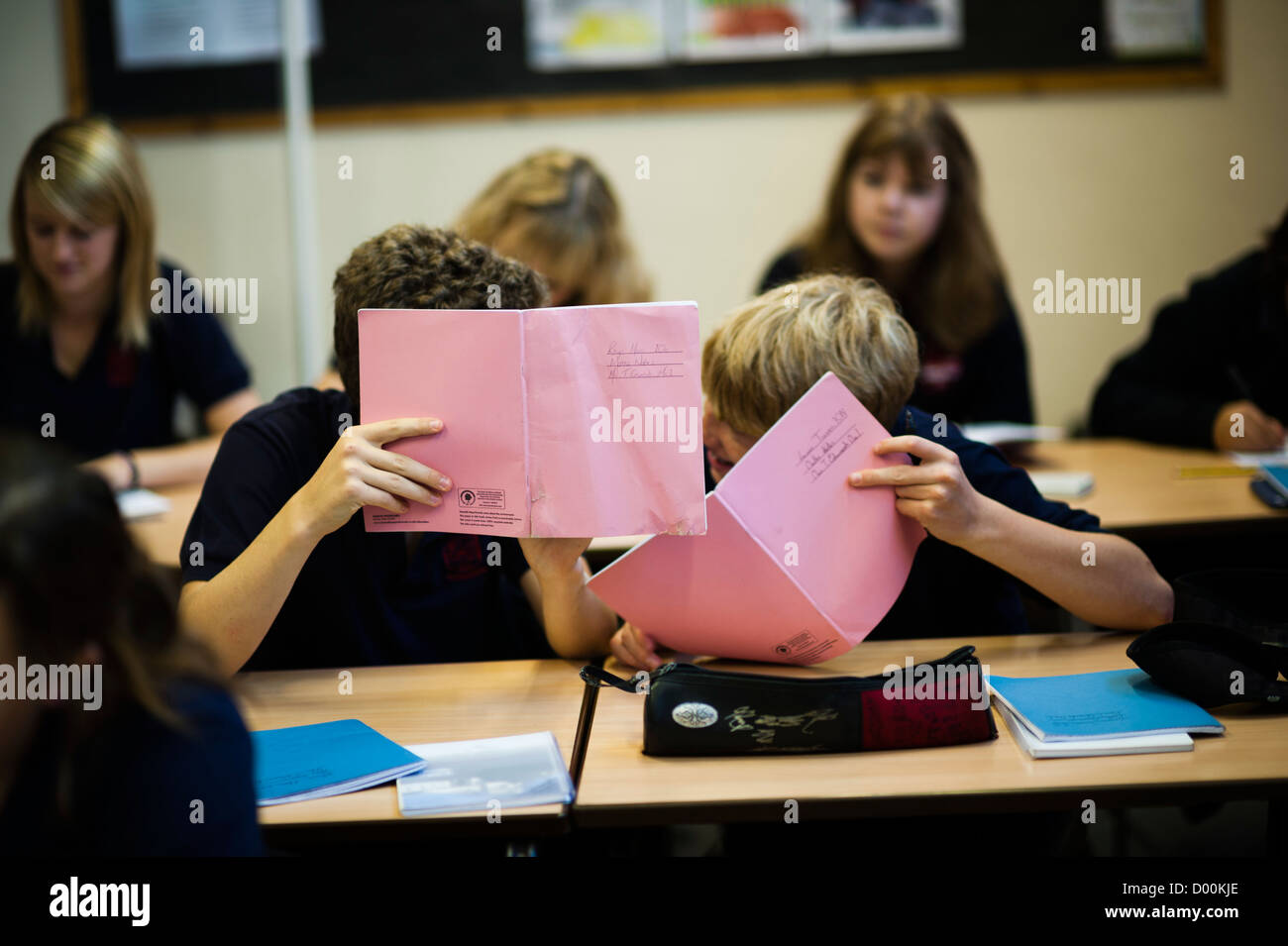Teenage School pupils in a GCSE mathematics class at a secondary ...