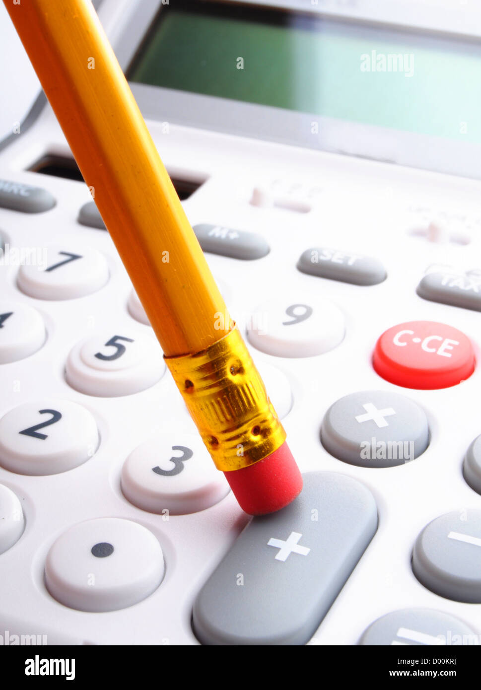 adding up figures concept with modern white calculator in office Stock ...