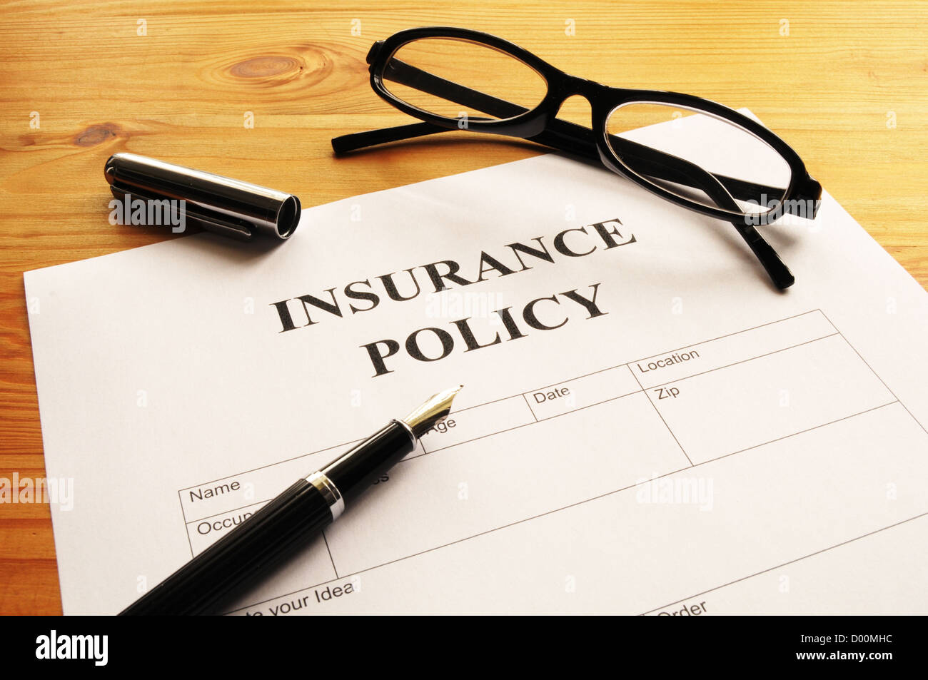 insurance policy form on desk in office showing risk concept Stock ...