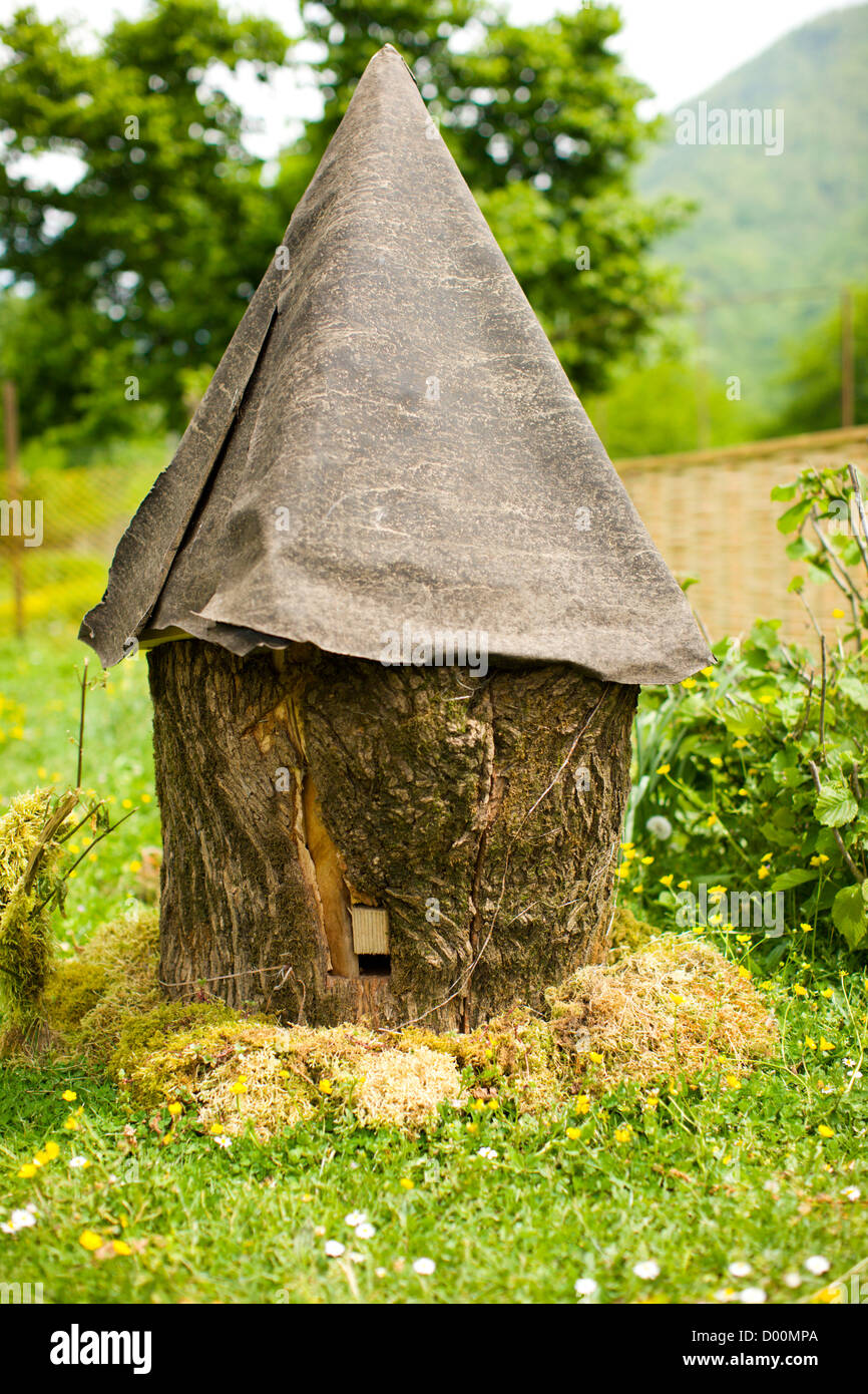 Yellow rural hive for bee colony summer day closeup Stock Photo - Alamy