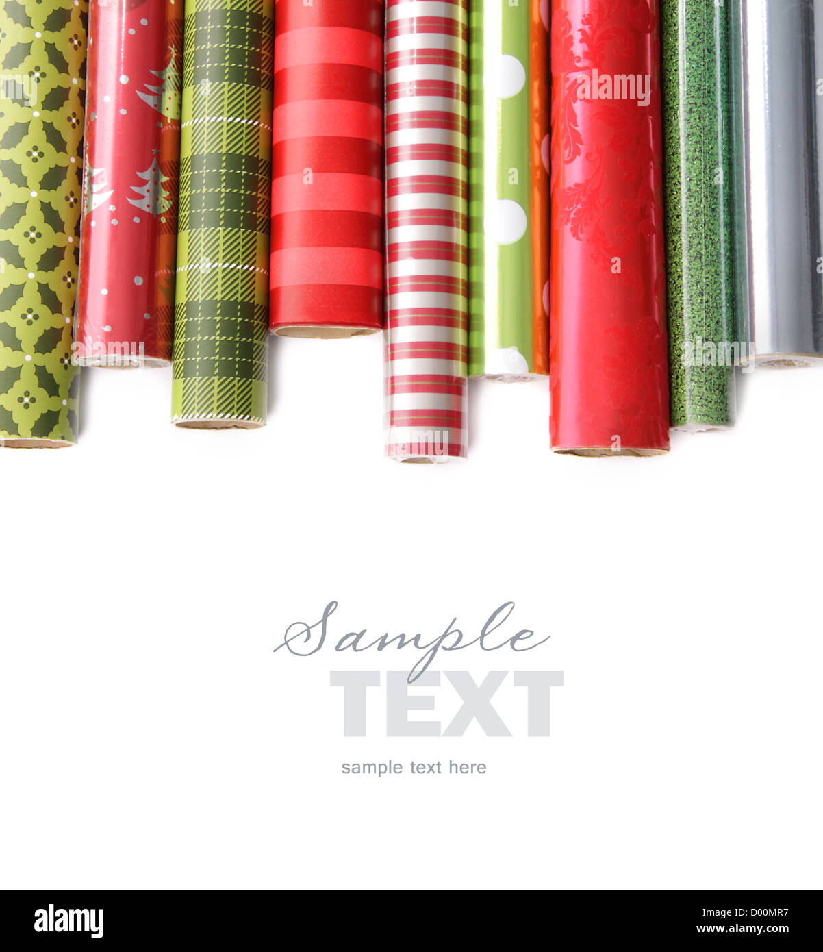 Rolls of colored wrapping paper on white background Stock Photo - Alamy