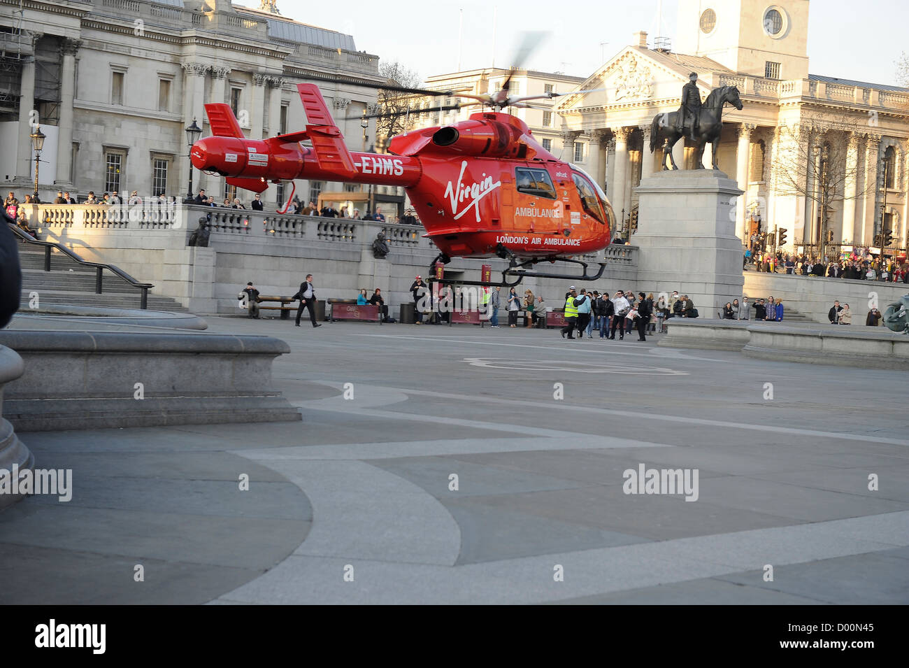 LONDON. UK. 21/03/2012. London Air Ambulance helicopter HEMS lands in ...