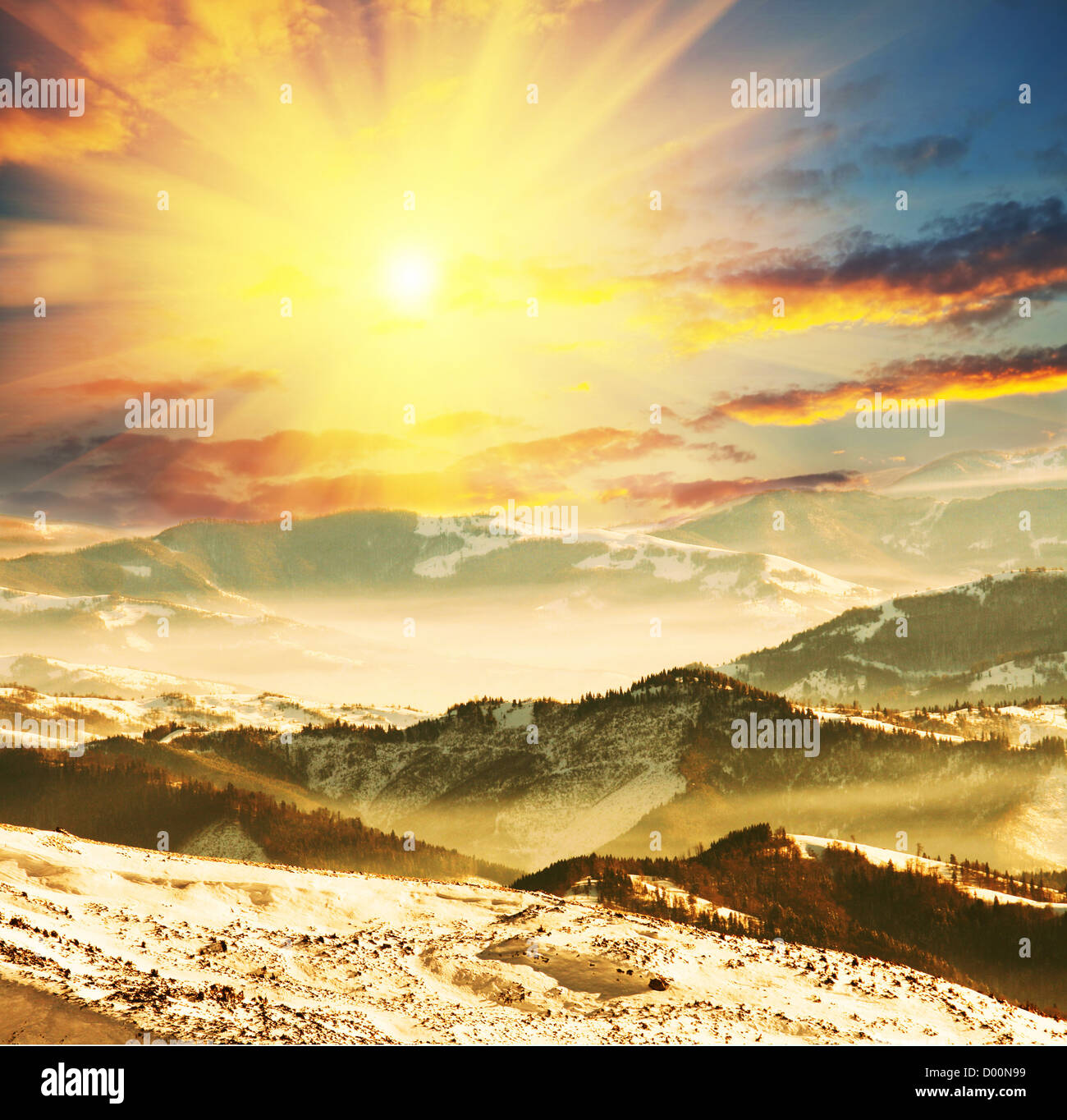 Sunset in mountains Stock Photo - Alamy