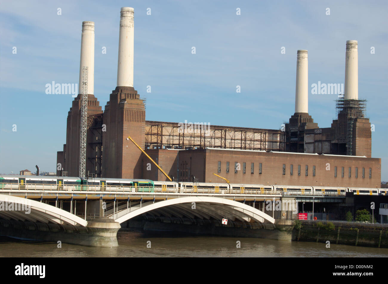 Battersea Power Station and Victoria Railway Bridge in London, England ...