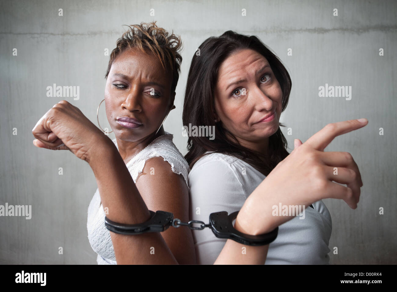 Female prisoner and handcuffs hi-res stock photography and images - Alamy