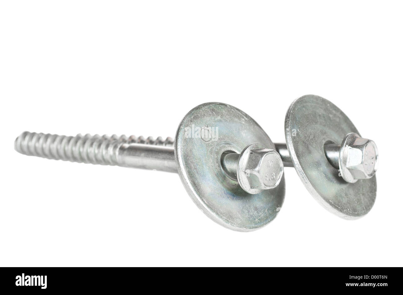 Screws over a white background Stock Photo - Alamy