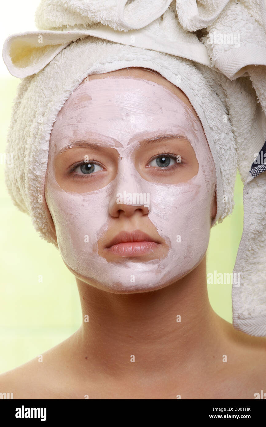 Portrait of a styled model with facial cream mask Stock Photo - Alamy
