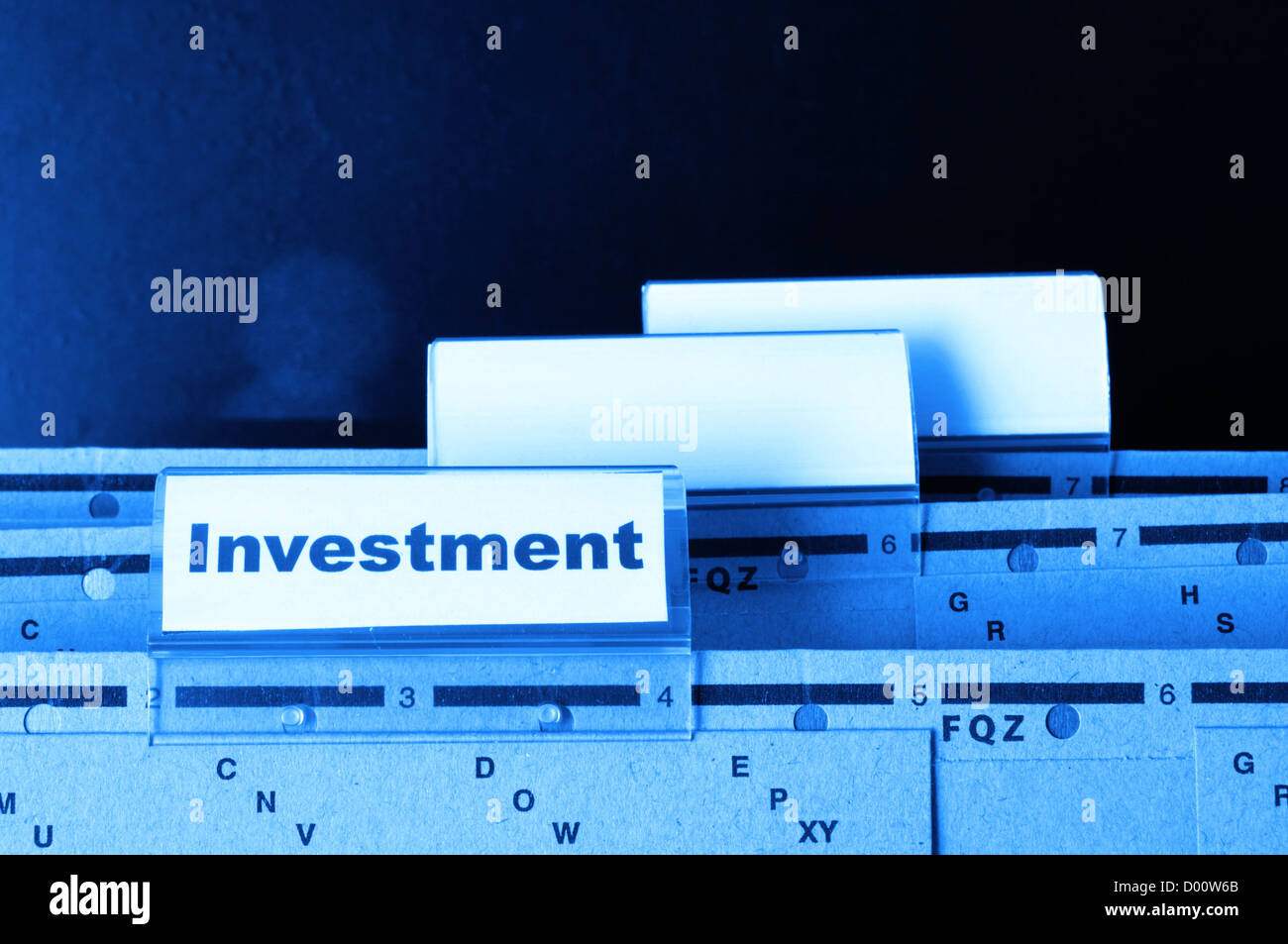 investment word on business folder showing financial success concept ...