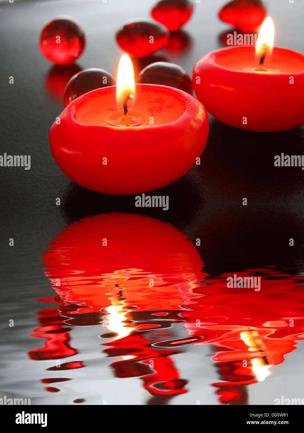 spa candle and water reflection showing zen concept Stock Photo - Alamy