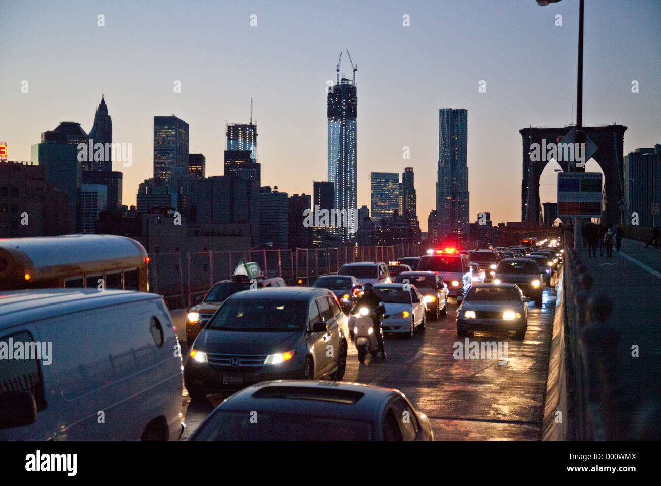 Driving on the Brooklyn Bridge at night Stock Photo - Alamy