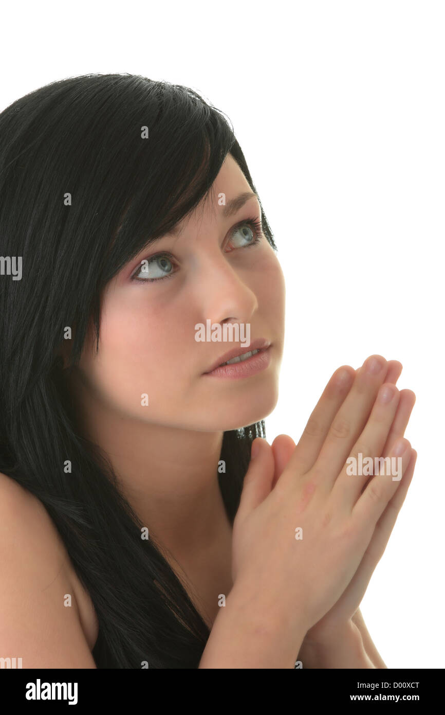 Praying Girl isolated on white background Stock Photo - Alamy