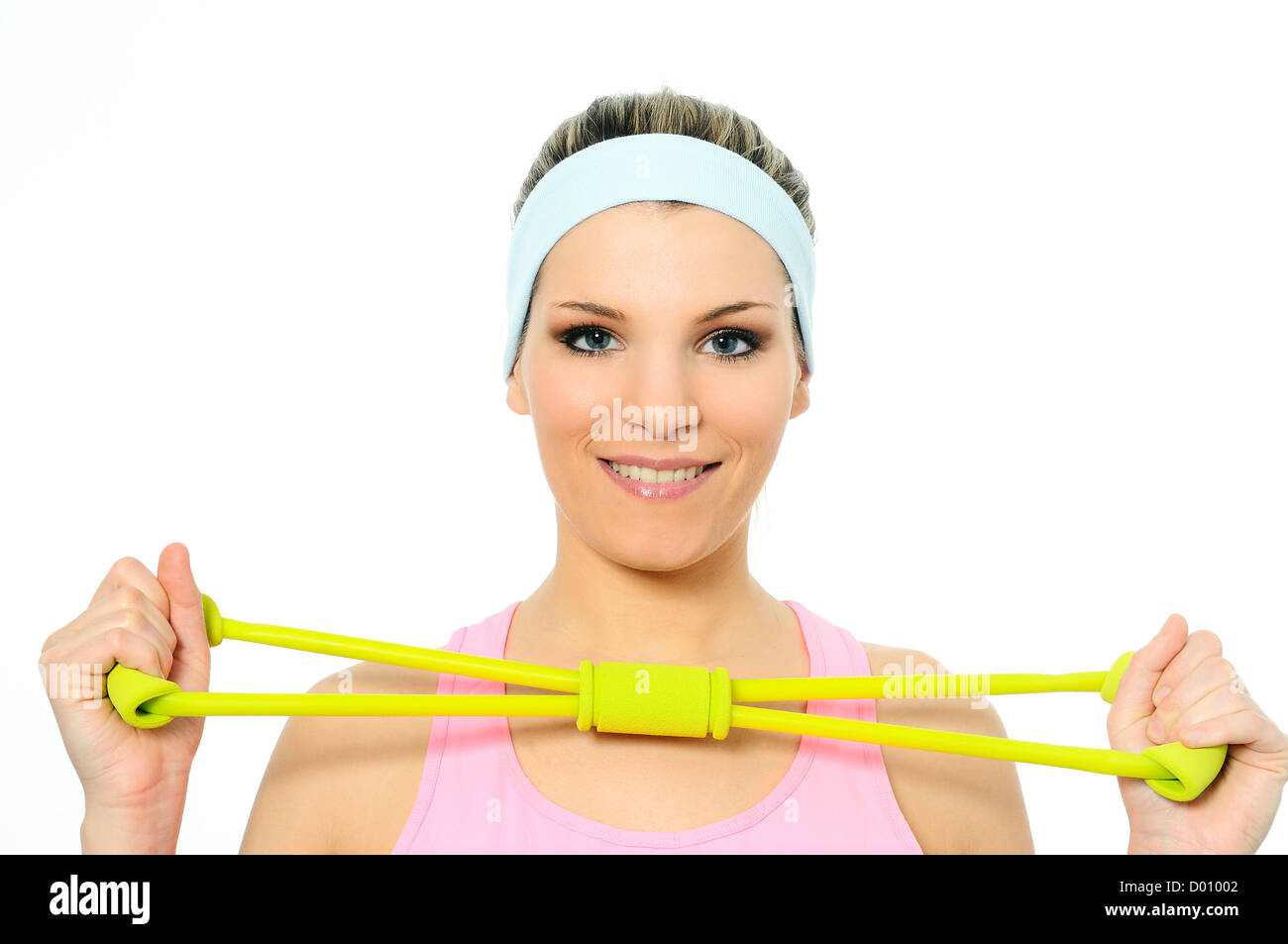 athletic woman doing gymnastic exercises with an elastic fitness Stock ...