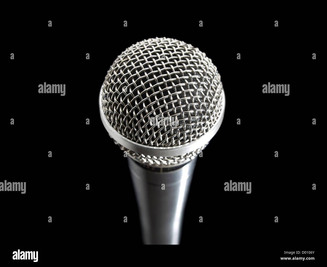 A dynamic microphone over a black background Stock Photo - Alamy
