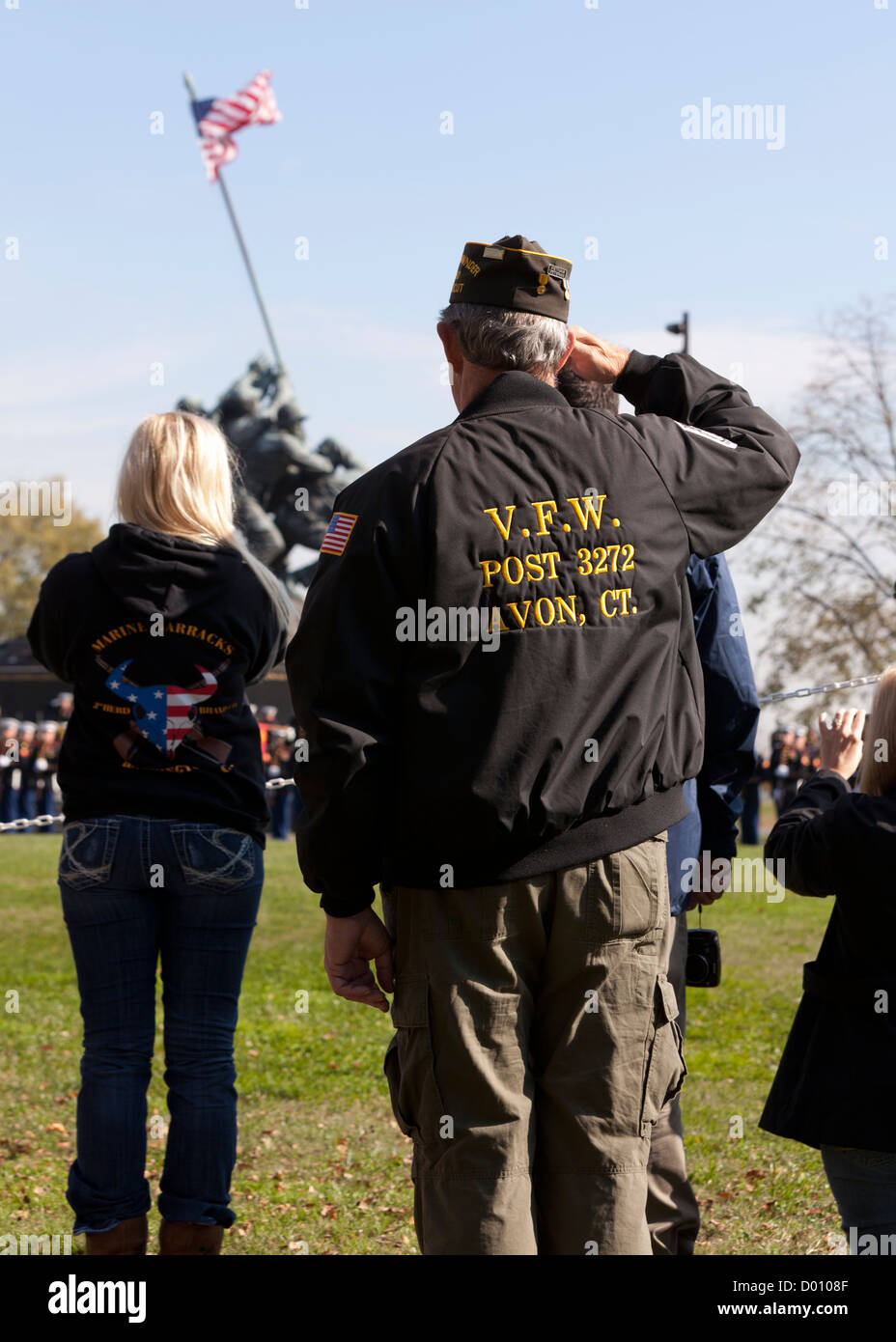 US military veteran saluting the American flag Stock Photo - Alamy