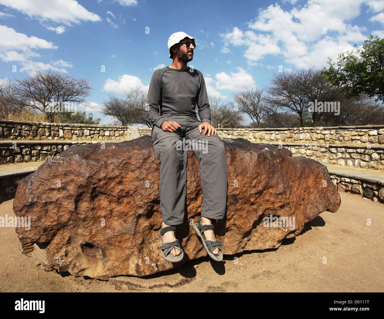 Tourist on Hoba meteorite Stock Photo - Alamy