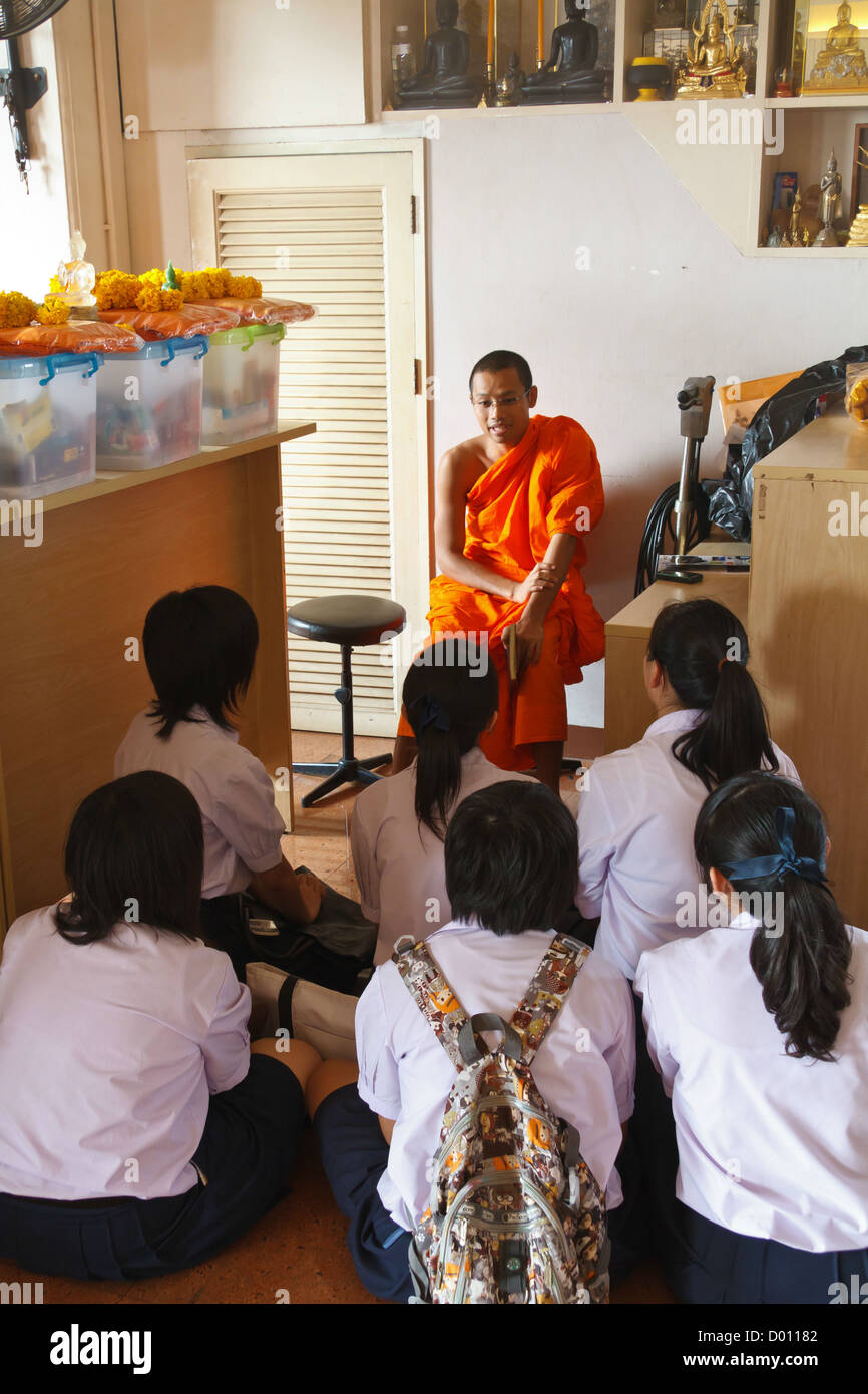 Buddhist Monk talking to Students on the Golden Mount in Bangkok ...