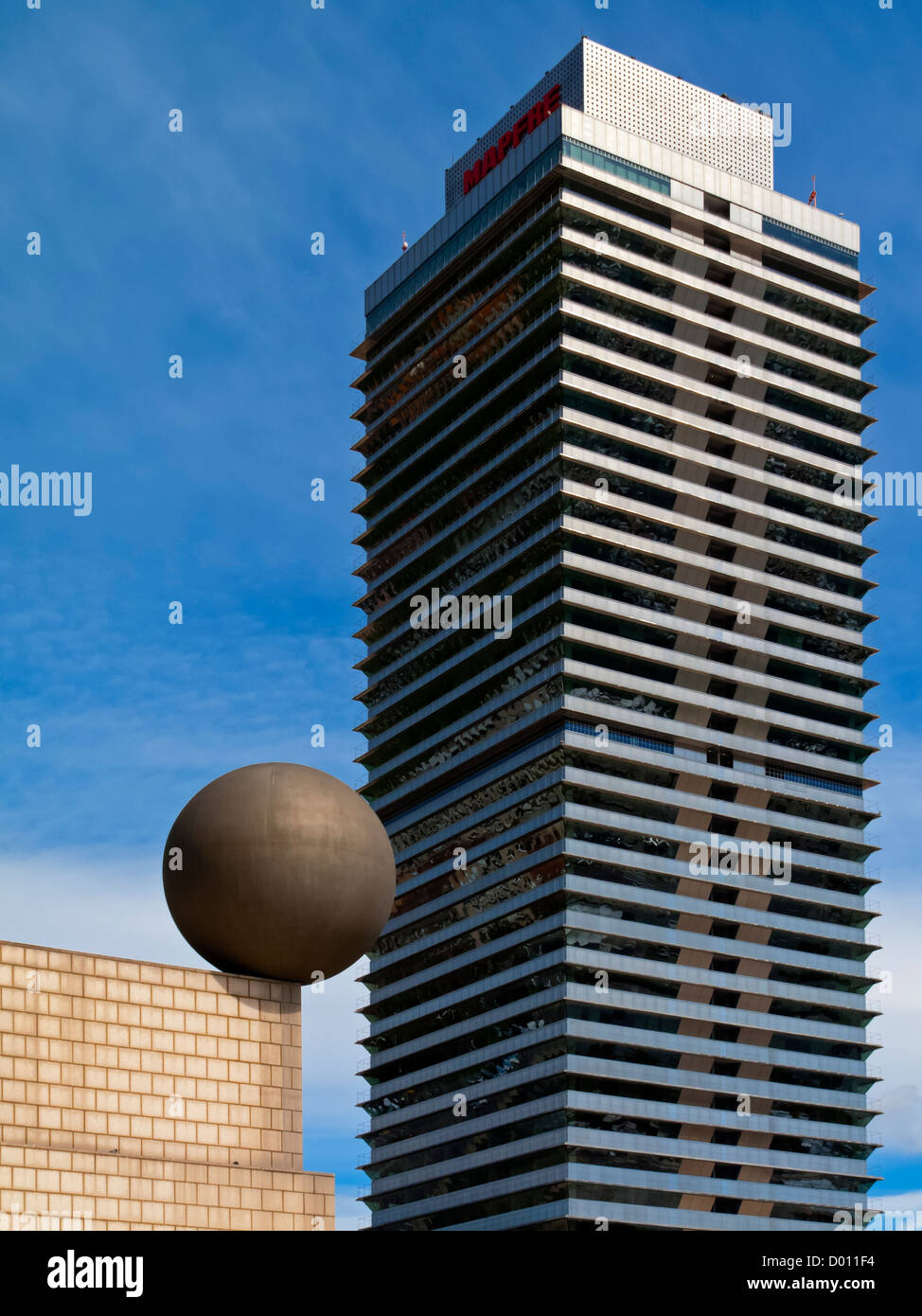The Mapfre Tower in Barceloneta Barcelona Catalonia Spain with stone ...