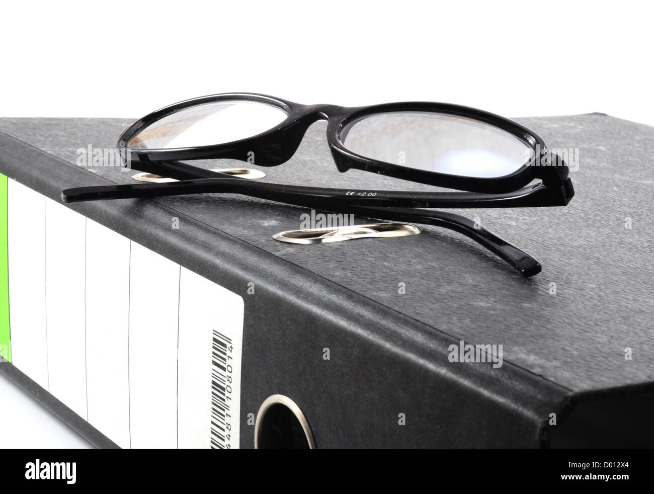 eye glasses and folder in the office showing paperwork concept Stock ...