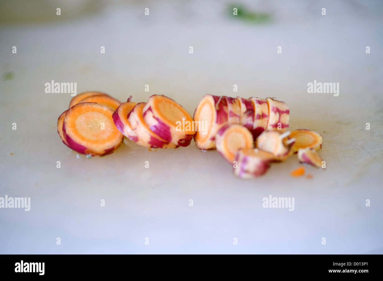 Root vegetable cut into pieces on a counter top Stock Photo - Alamy