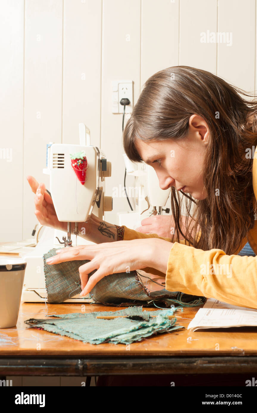 Threading an industrial sewing machine hi-res stock photography and ...
