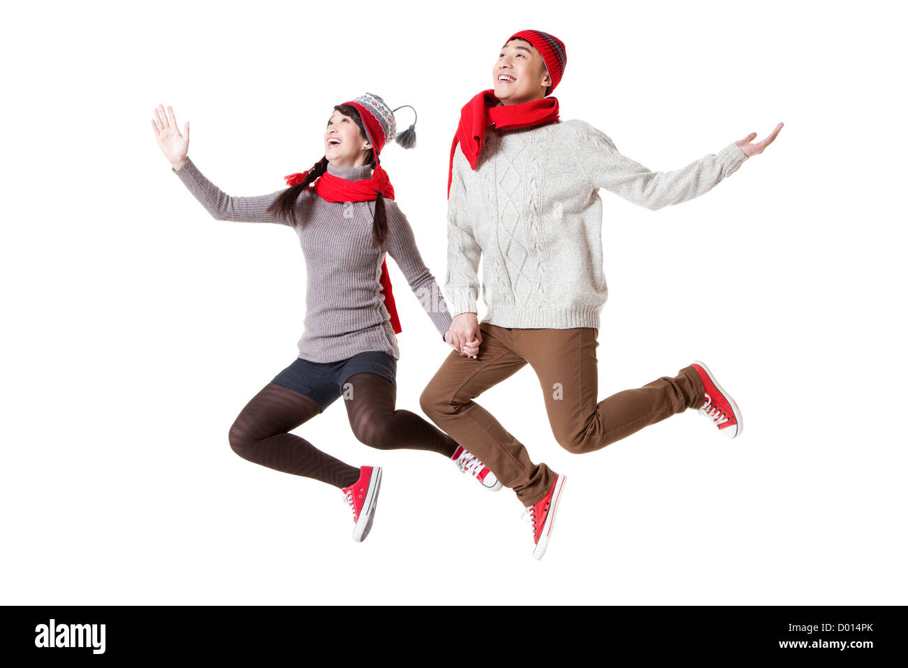 Young couple jumping cheerfully in Chinese New Year Stock Photo - Alamy