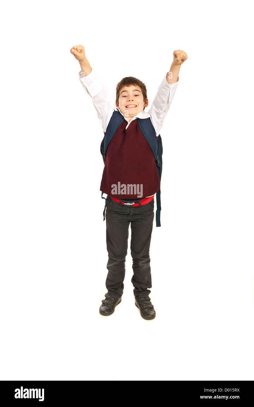 Cheering successful school boy raising hands isolated on white ...