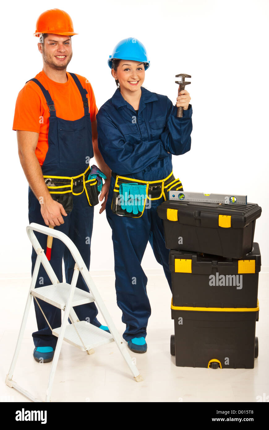 Full length of plumbers workers against white background Stock Photo ...