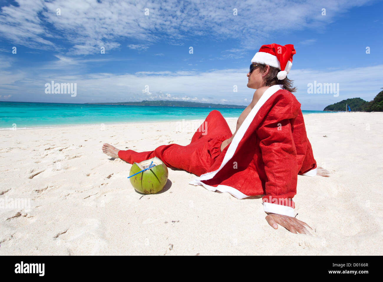 Santa Claus on beach relaxing, enjoing summer Stock Photo - Alamy