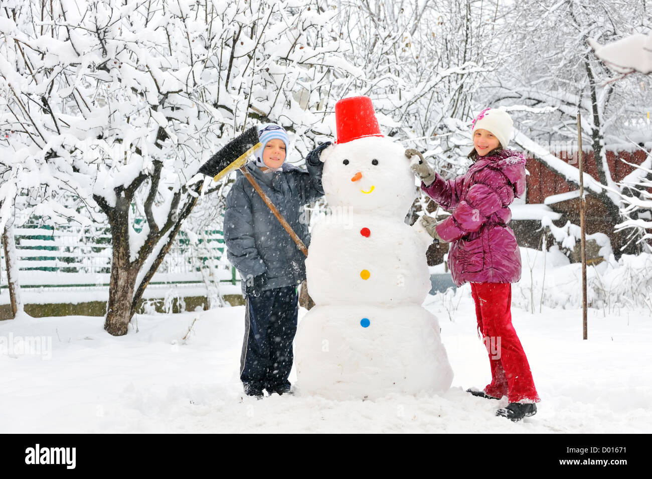 snowman and kids Stock Photo - Alamy