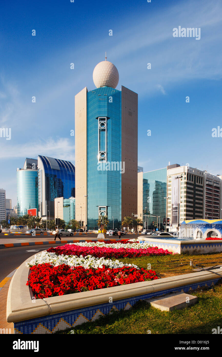 Architecture, bright flowers, and sunshine combine to make a colourful ...